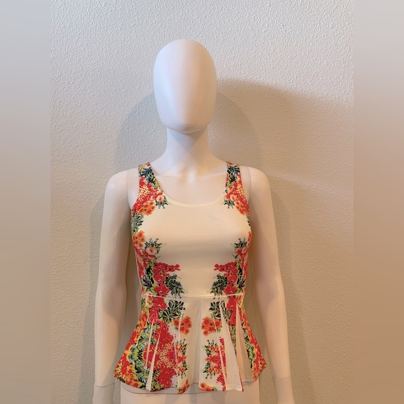 Codigo | Tops | White Pleated Peplum Top Multicolored Floral Pattern On ...